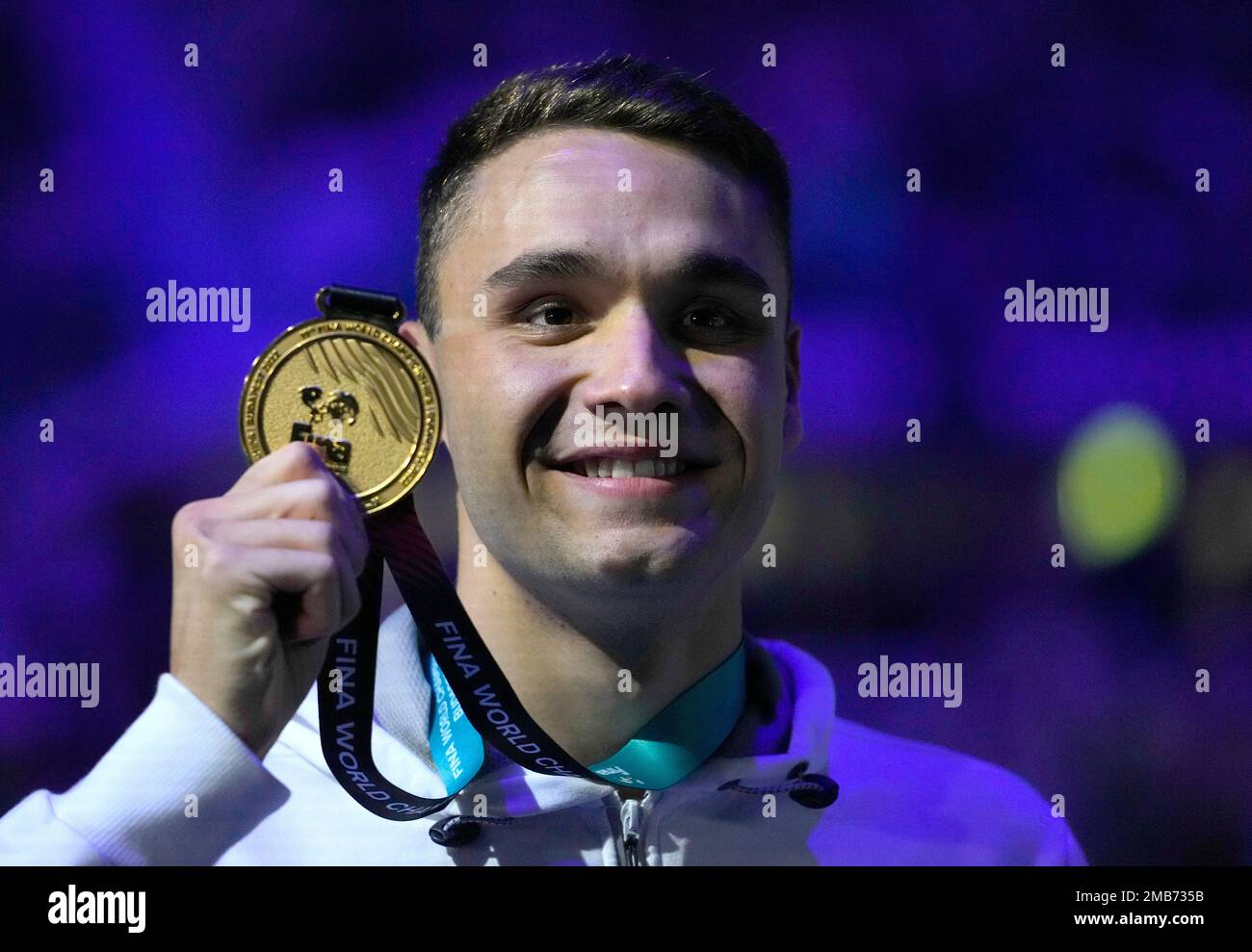 Gold medalist Kristof Milak of Hungary poses with his medal after the ...