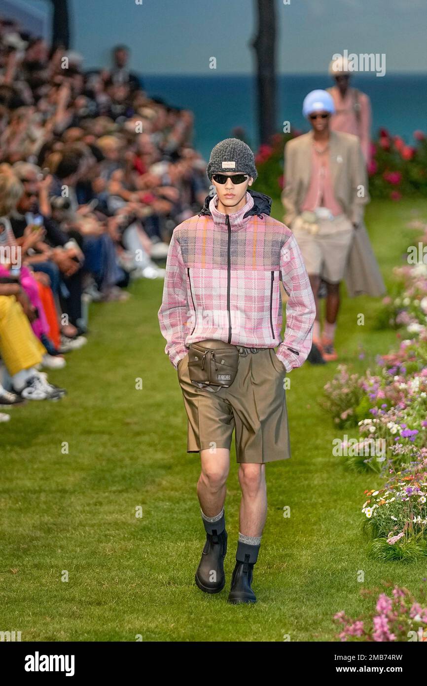 A model wears a creation as part of the Dior men's Spring Summer 2023 ...