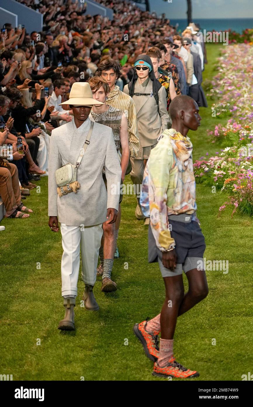A model wears a creation as part of the Dior men's Spring Summer 2023 ...