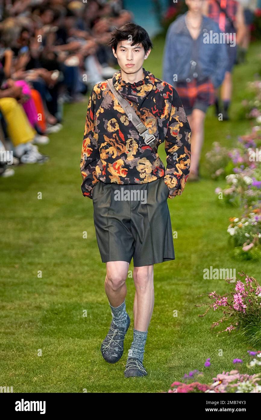 A model wears a creation as part of the Dior men's Spring Summer 2023 ...
