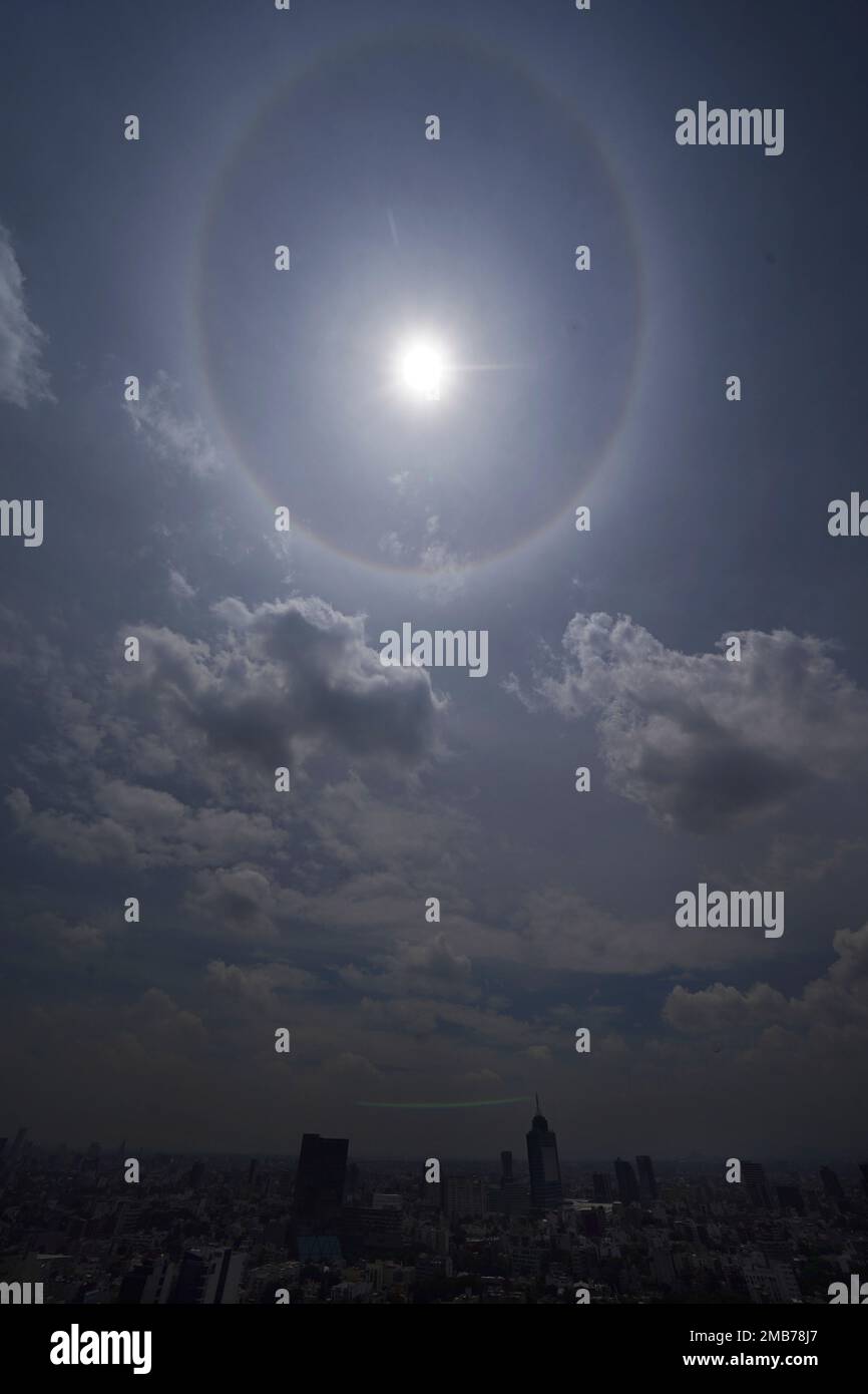 A halo forms around the sun in Mexico City, Thursday, June 23, 2022 ...