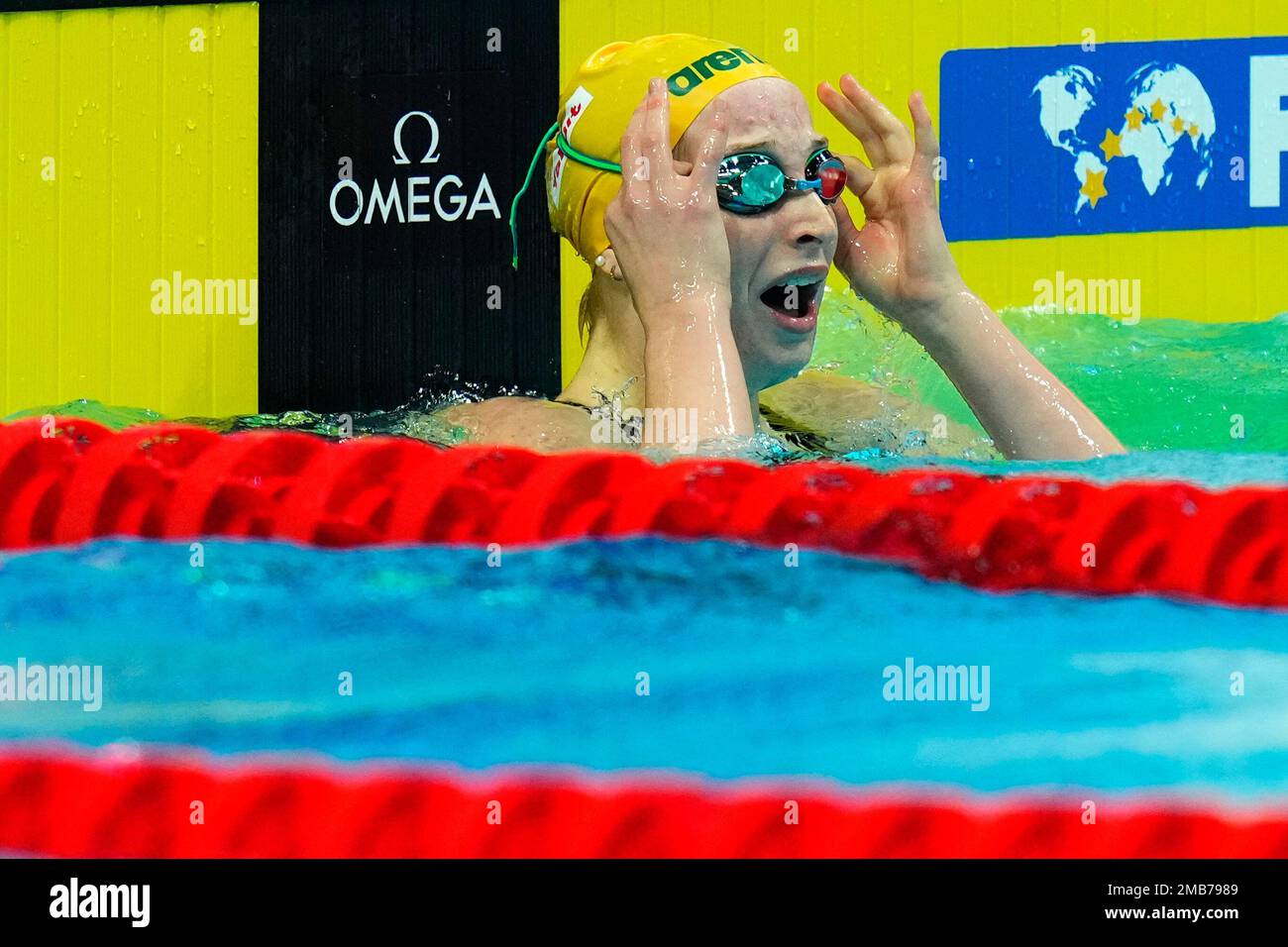 Mollie O'Callaghan of Australia reacts after winning the women's 100m ...