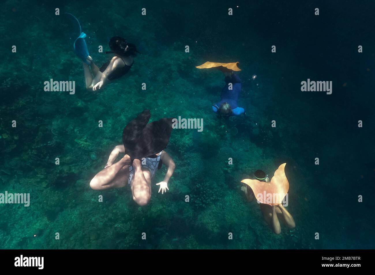 Queen Pangke Tabora, right, conducts a mermaiding class in Mabini ...