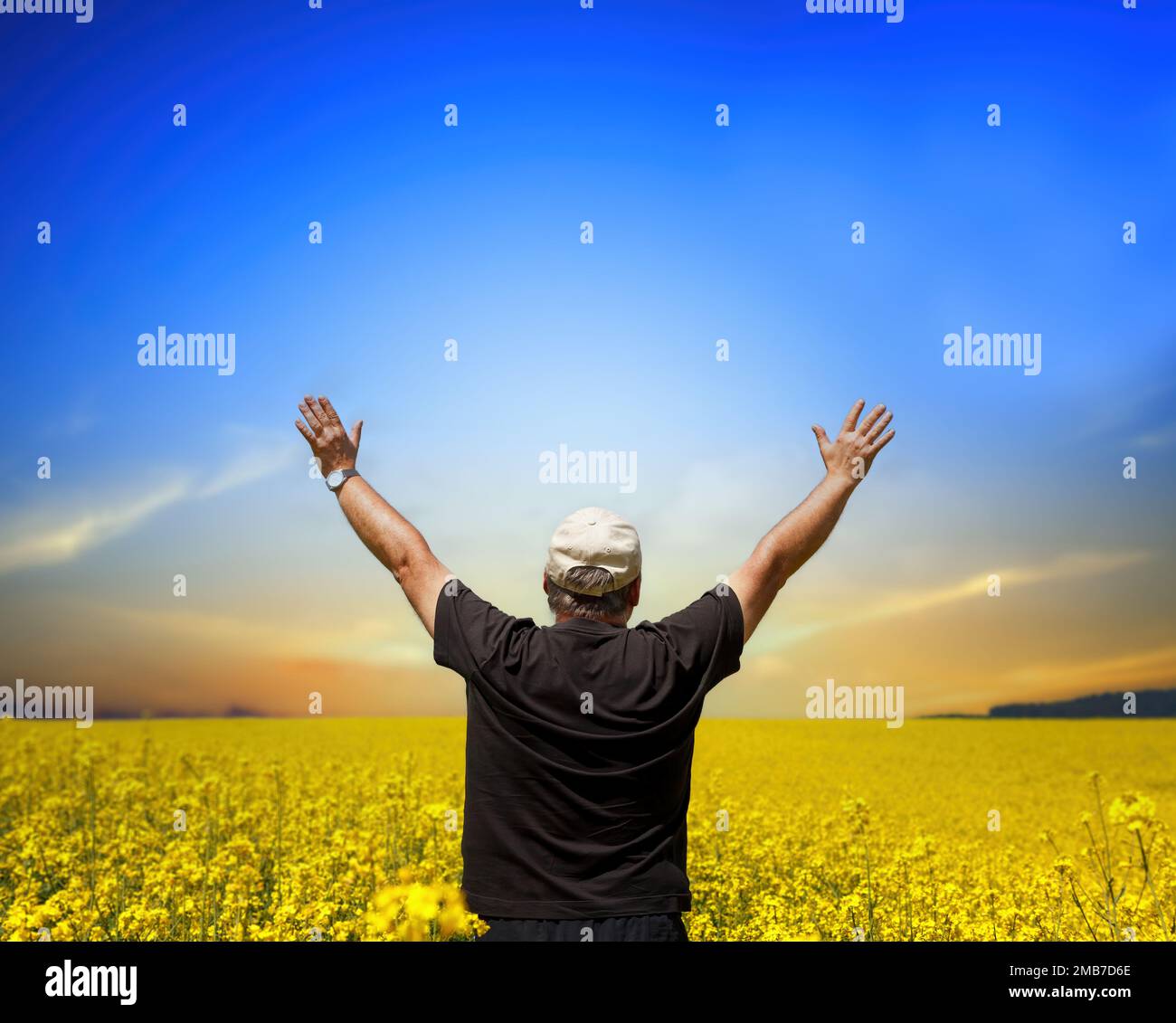 The man raised his hands up Stock Photo - Alamy