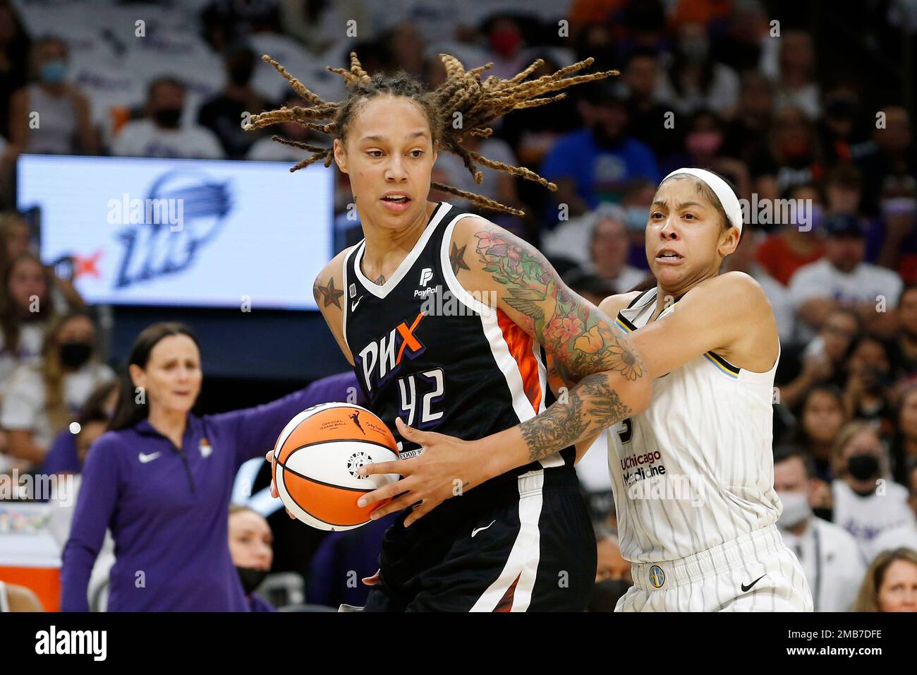 FILE - Phoenix Mercury center Brittney Griner (42) drives past Chicago ...