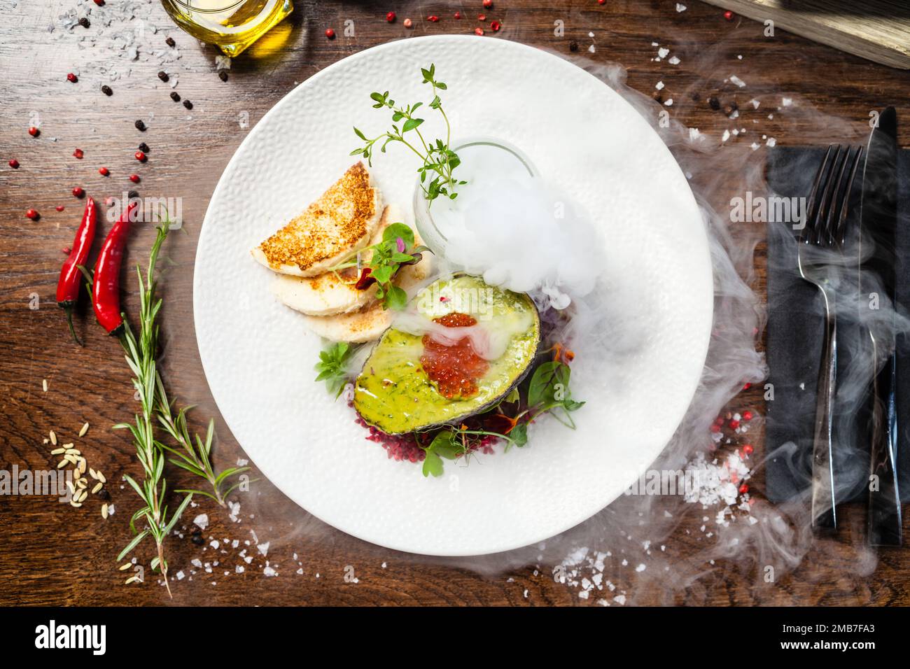 Tuna tartare. Trout roe, avocado cream, marinated onions. Delicious ...