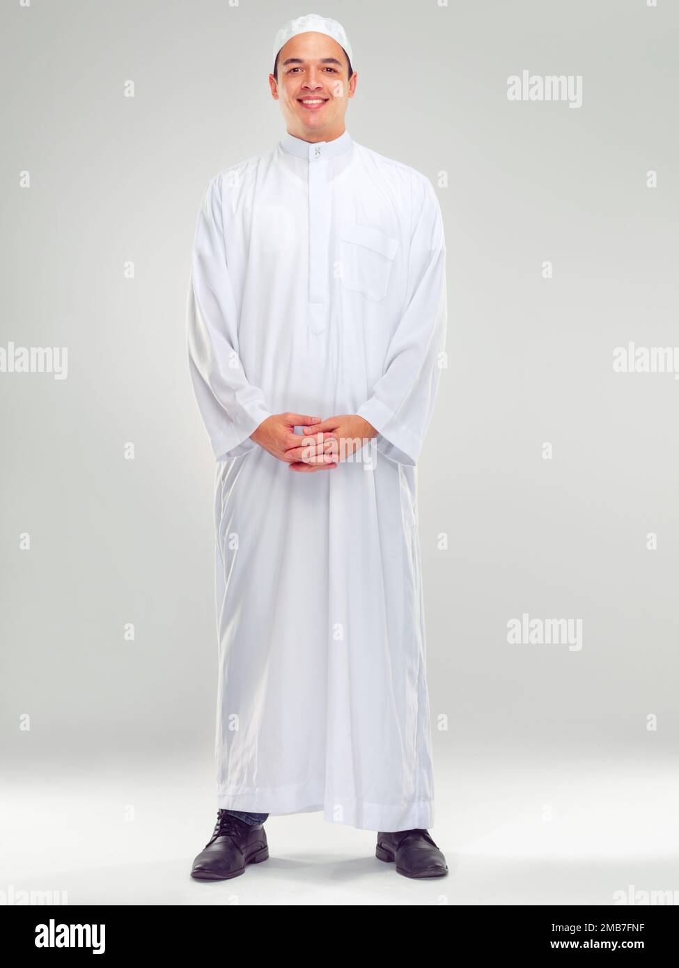 Islamic man, religion fashion and standing for worship, prayer or ...