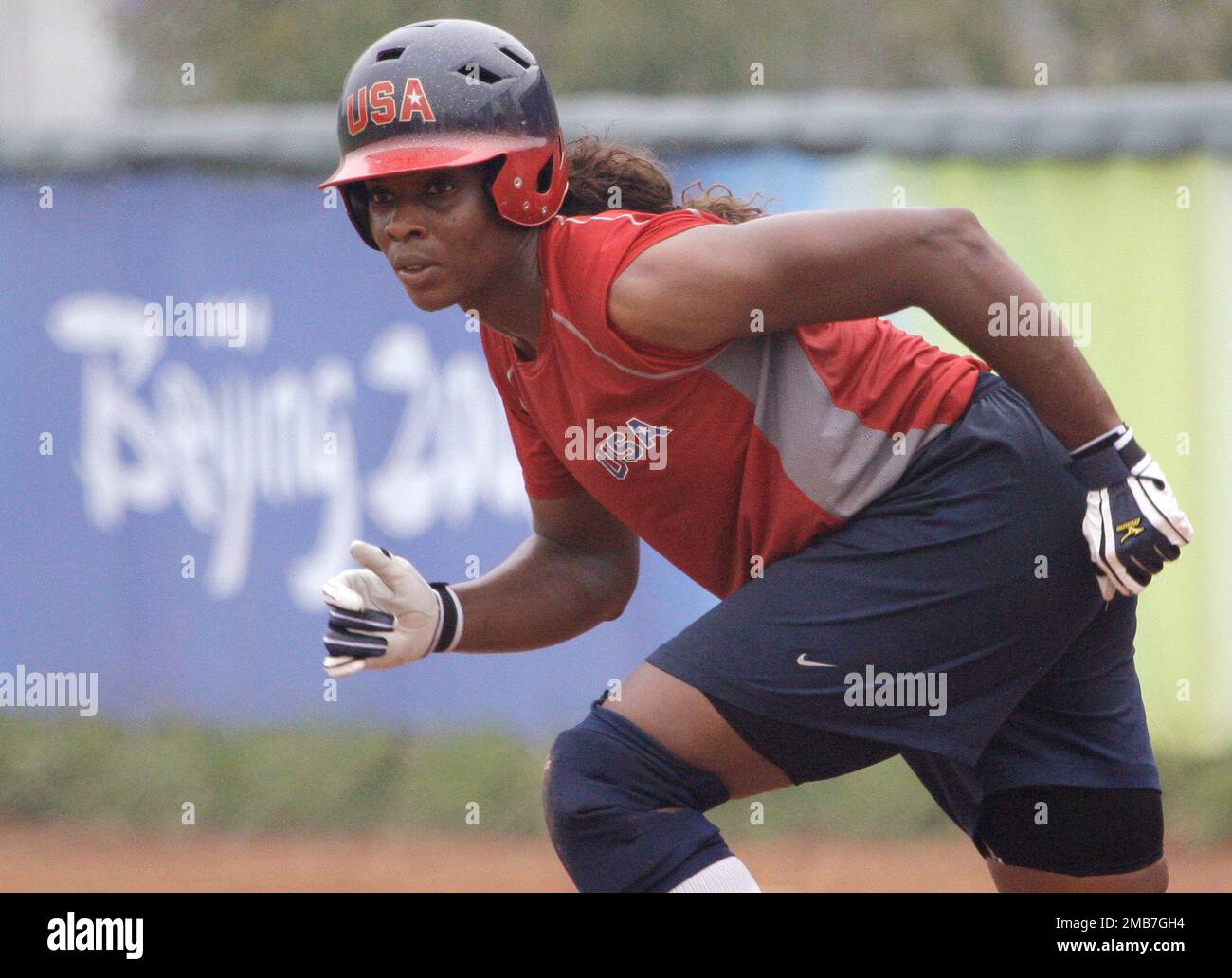 FILE - U.S. softball player Natasha Watley runs during practice Sunday ...
