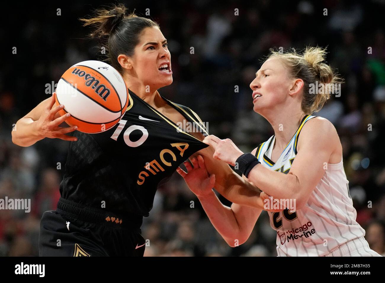 Chicago Sky guard Courtney Vandersloot, right, fouls Las Vegas Aces ...
