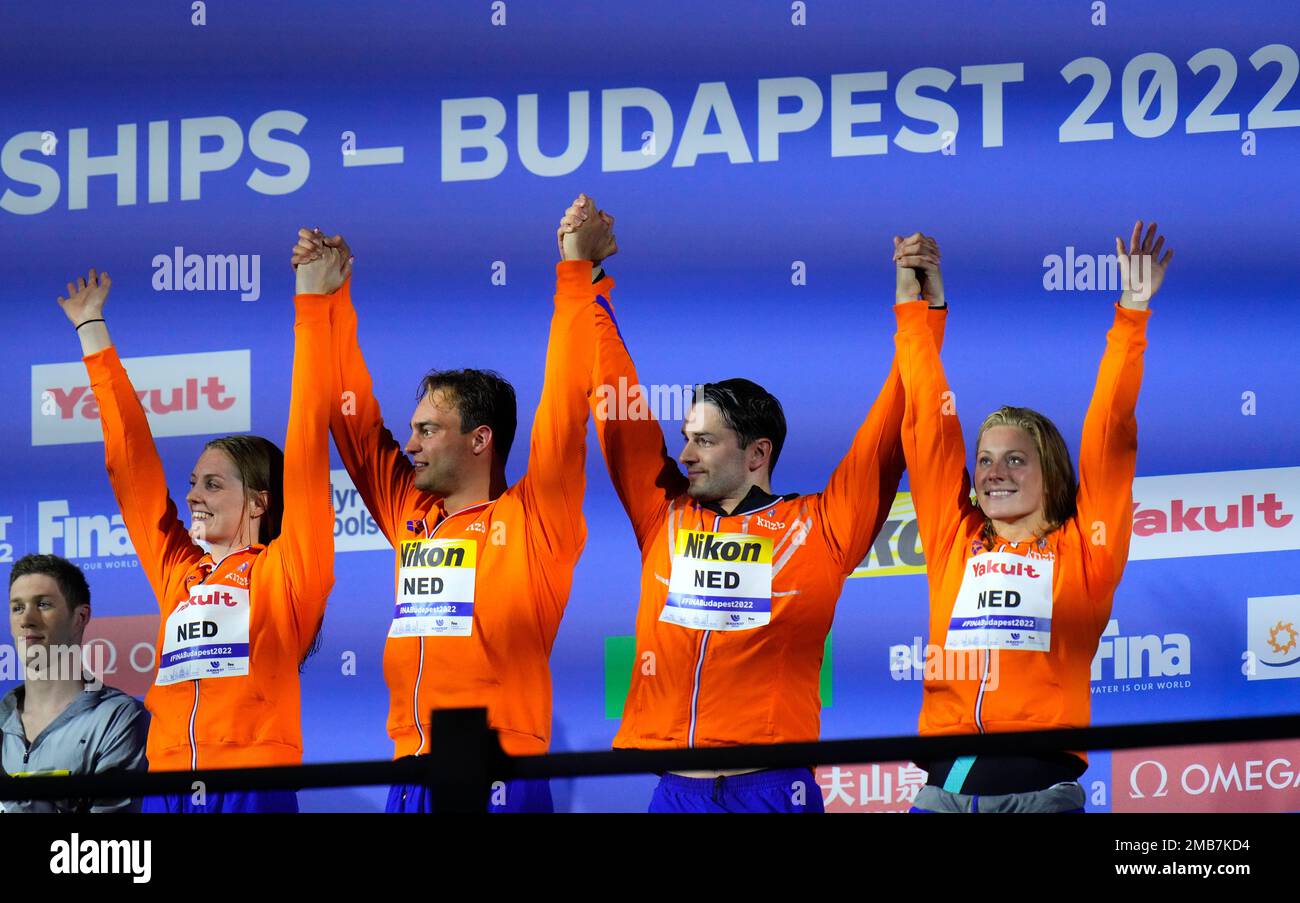 The Netherlands team celebrate their third place after the Mixed 4x100m ...