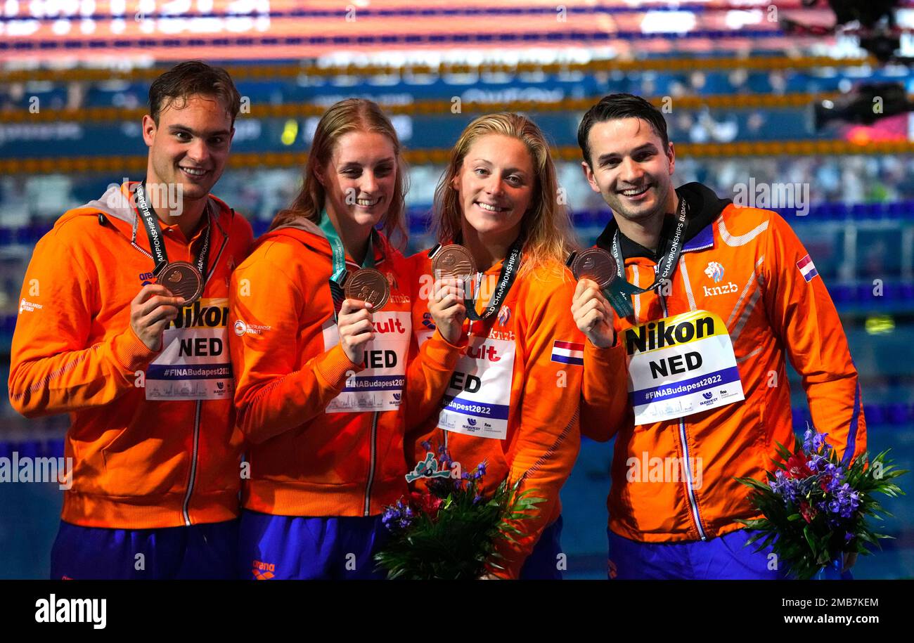 The Netherlands team pose with their bronze medals after the Mixed ...