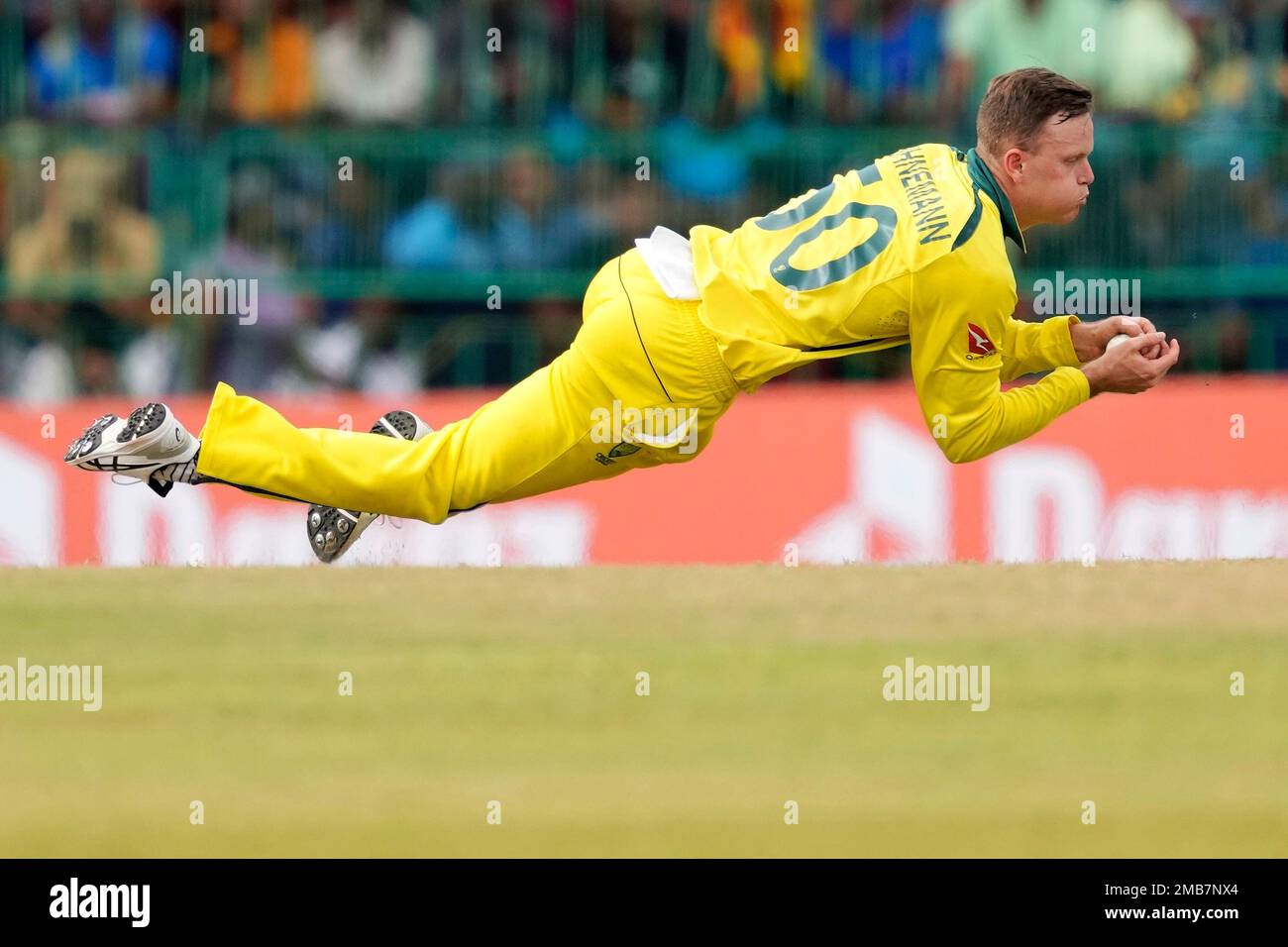 Australia's Matthew Kuhnemann fields a ball during the fourth one-day ...