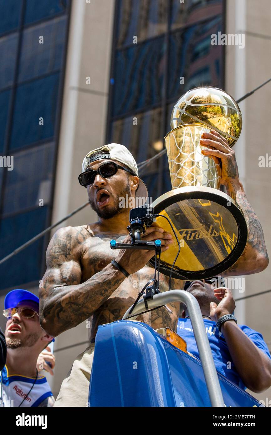 Golden State Warriors' Juan Toscano-Anderson holds the Larry O'Brien ...
