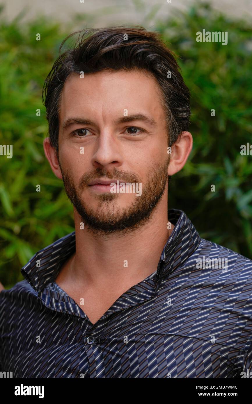 Jonathan Bailey poses for photographers before the Giorgio Armani men's ...