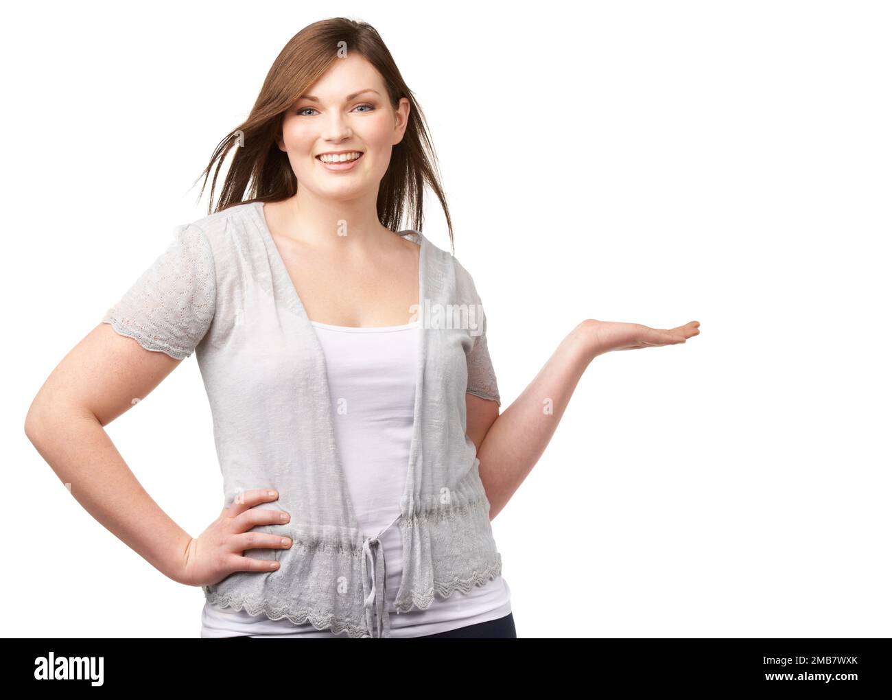 Put your awesome product in my palm. A pretty young woman holding her ...