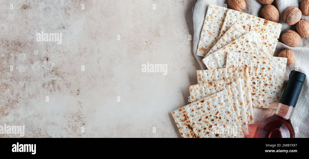 Passover celebration concept. Matzah, red kosher and walnut ...