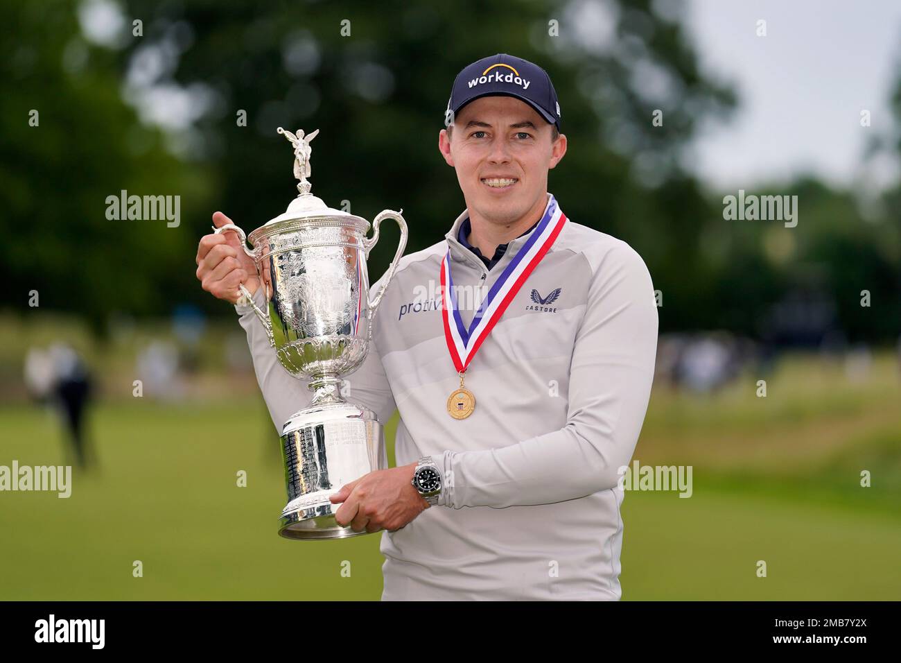 Matthew Fitzpatrick, of England, poses with the trophy after winning ...