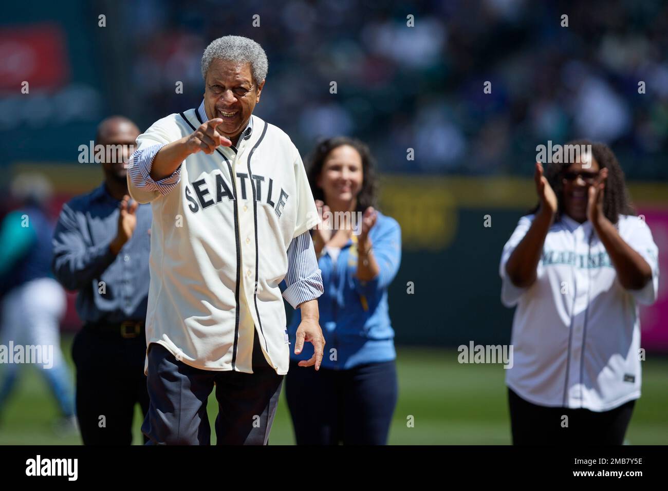 Former Seattle Supersonics basketball player Freddy Brown points toward ...