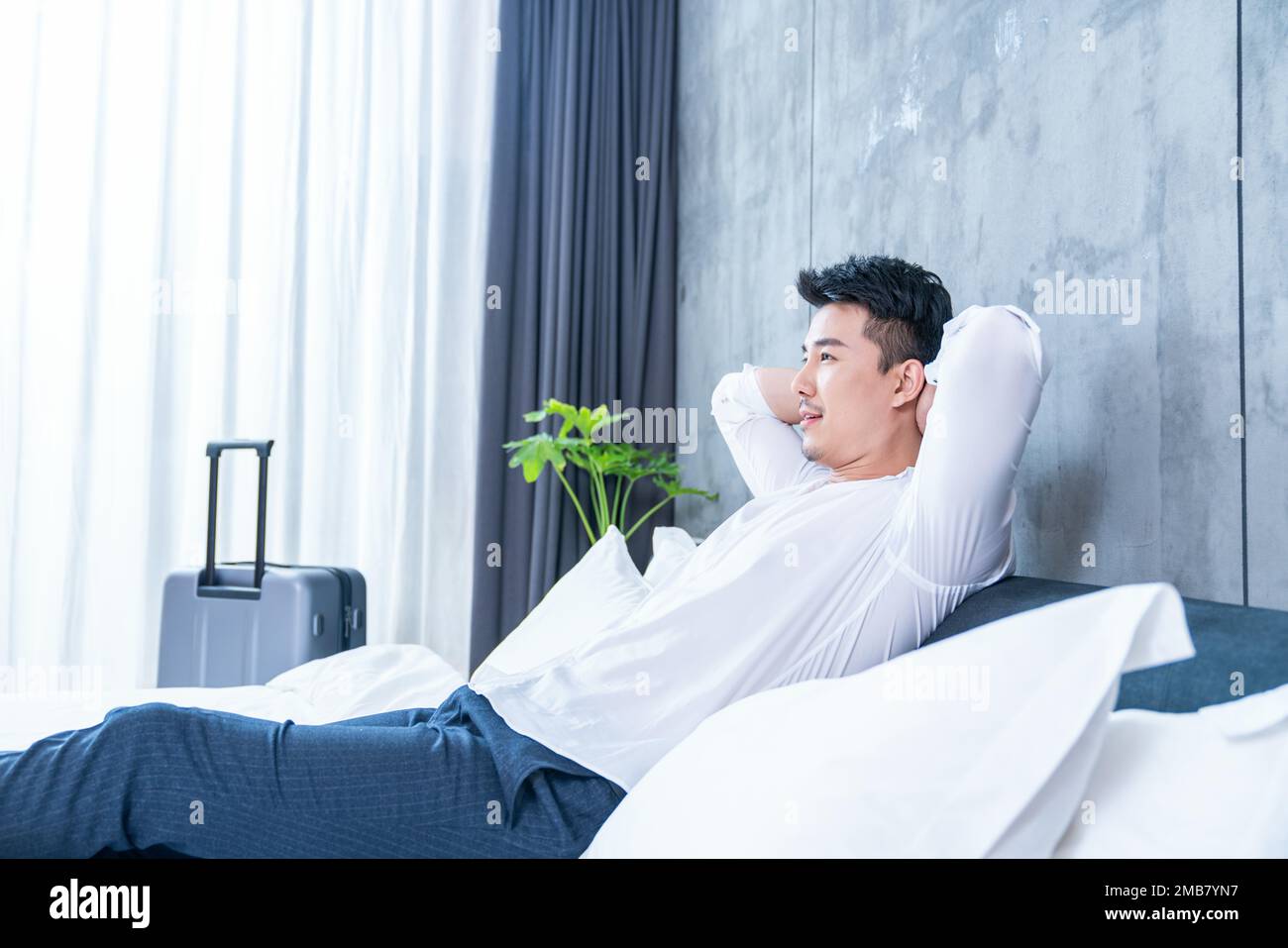 Business man in the hotel to rest Stock Photo - Alamy