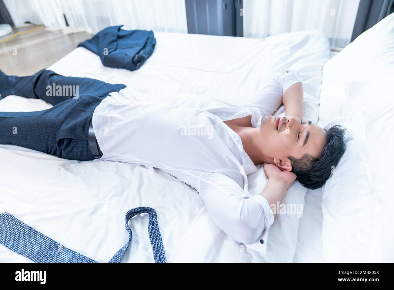 Business man in the hotel to rest Stock Photo - Alamy