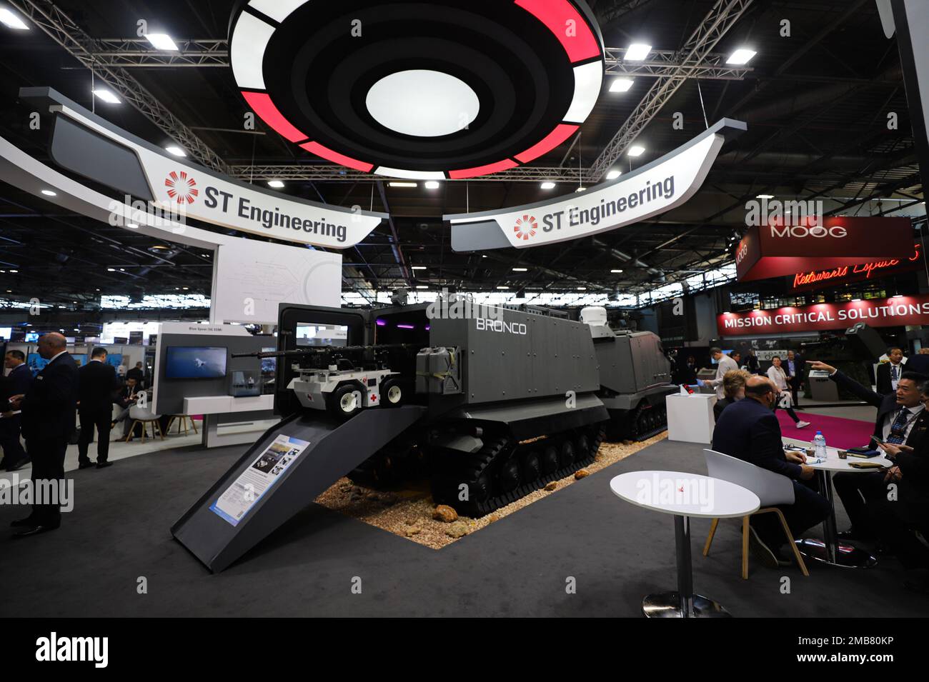 Onlookers spend time at one of the many exhibits displaying modernized ...