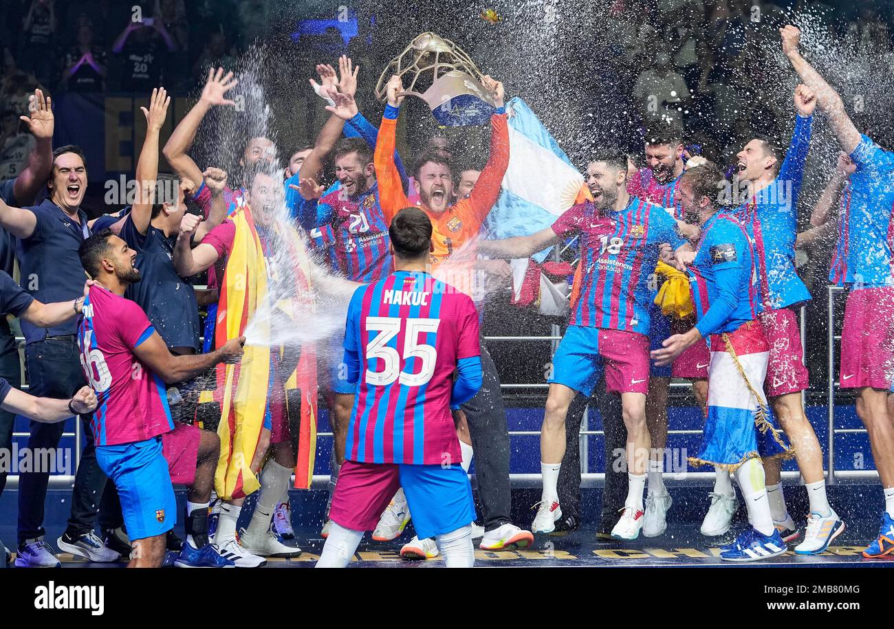 Team Barca celebrates with the trophy and champagne after winning the ...