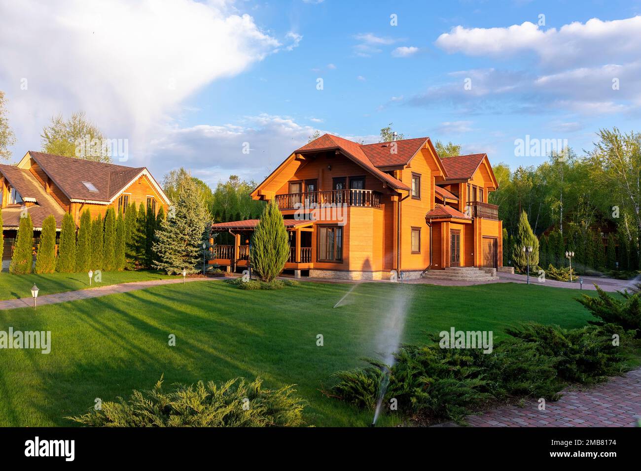 Modern wooden eco house villa facade luxury big house. Timber cottage ...