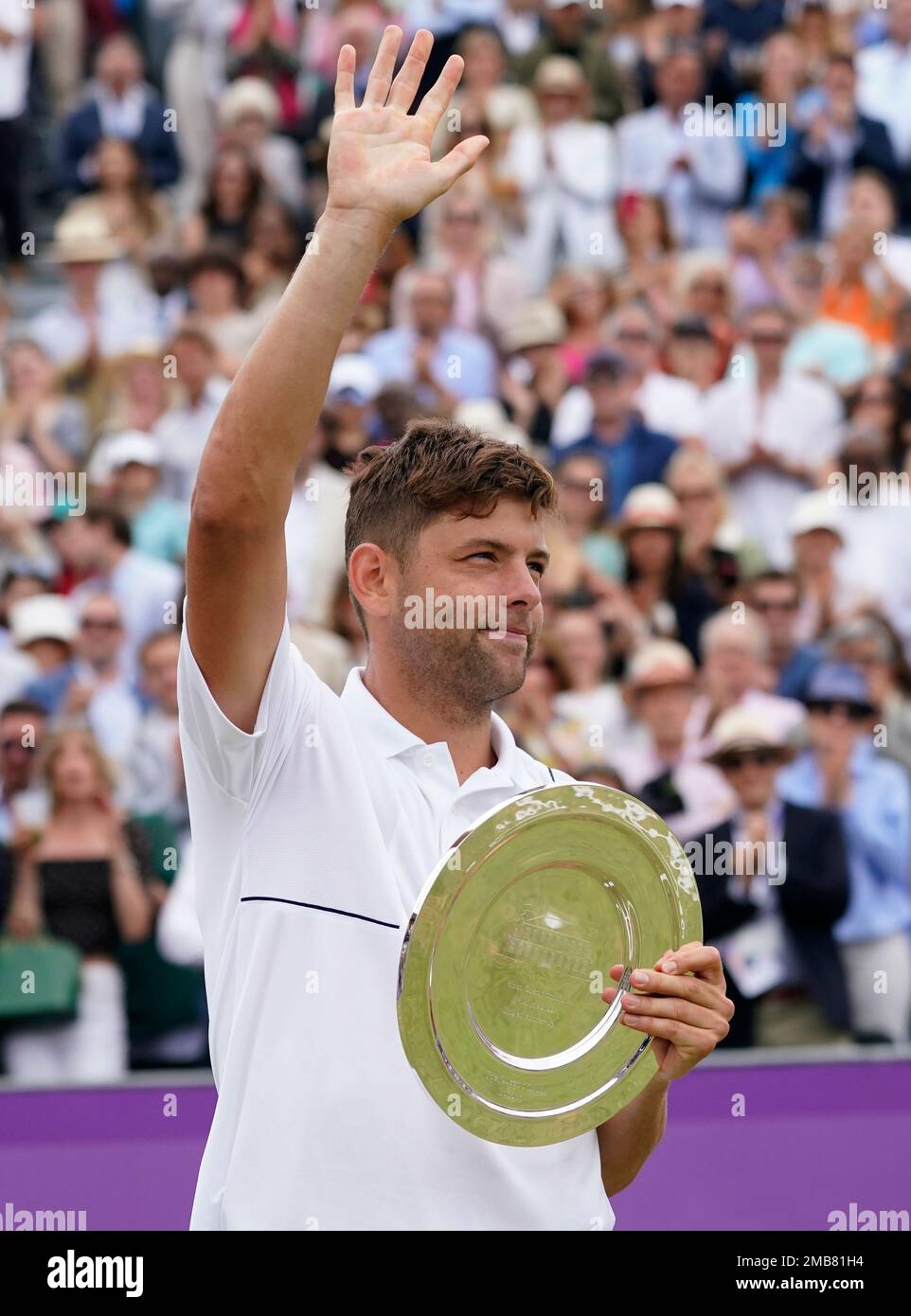 Serbia's Filip Krajinovic waves to the crowd after receiving his ...