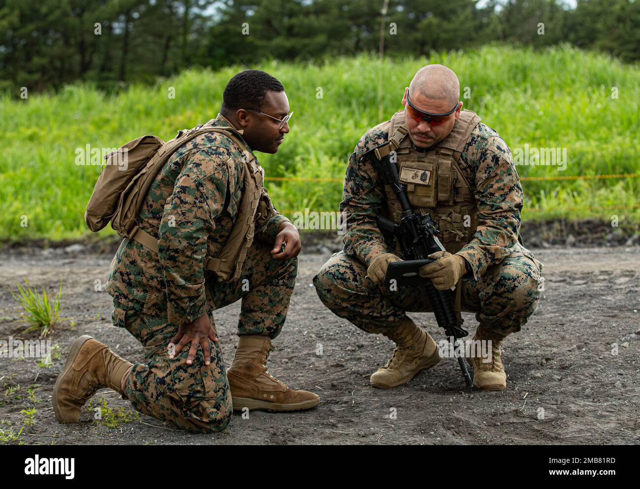 U.S. Marine Corps Sgt. Nicholas Downing, a motor vehicle operator, left ...
