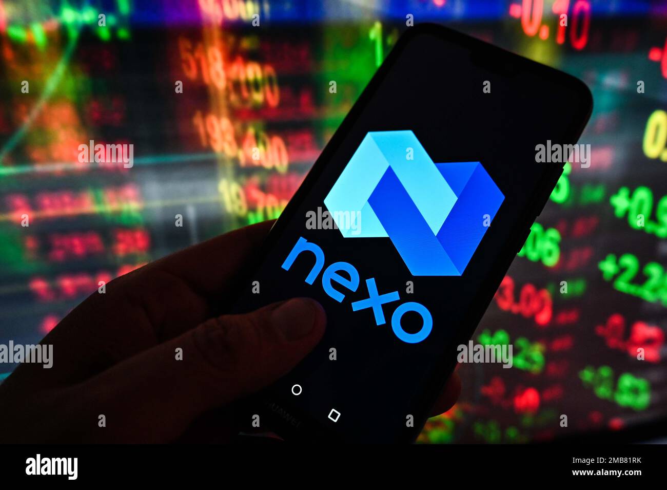 In this photo illustration, the NEXO logo seen displayed on a ...