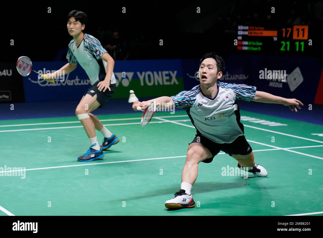 South Korea's Choi Sol-gyu, right, and Kim Won-ho compete against China ...