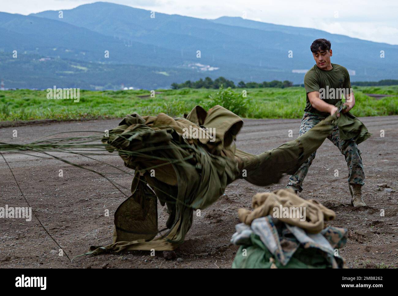 U.S. Marine Corps Sgt. Brad Clark, an air delivery specialist with ...