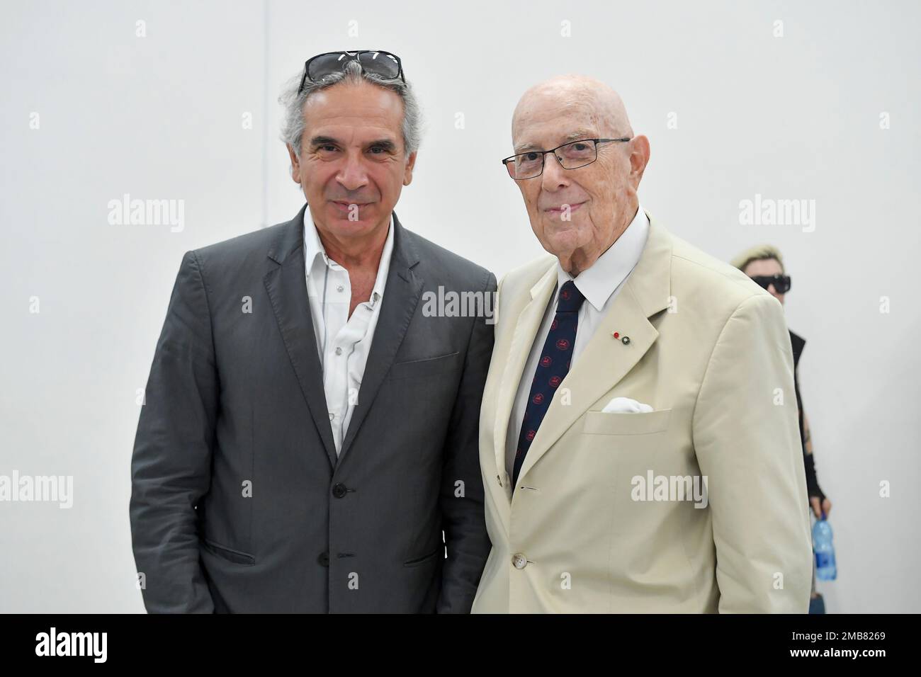 Carlo Capasa, left, and Mario Boselli attend the Simon Cracker men's ...