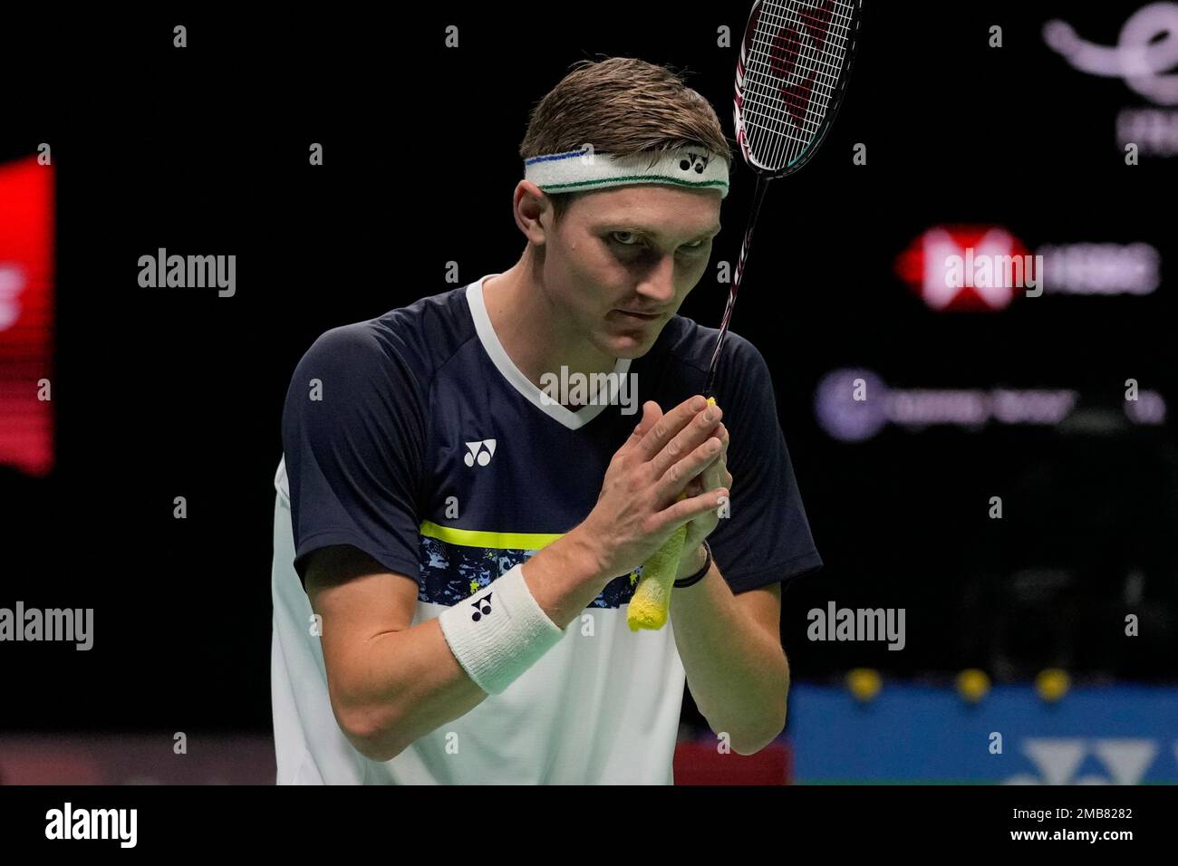 Denmark's Viktor Axelsen celebrates after defeating China's Zhao Jun ...