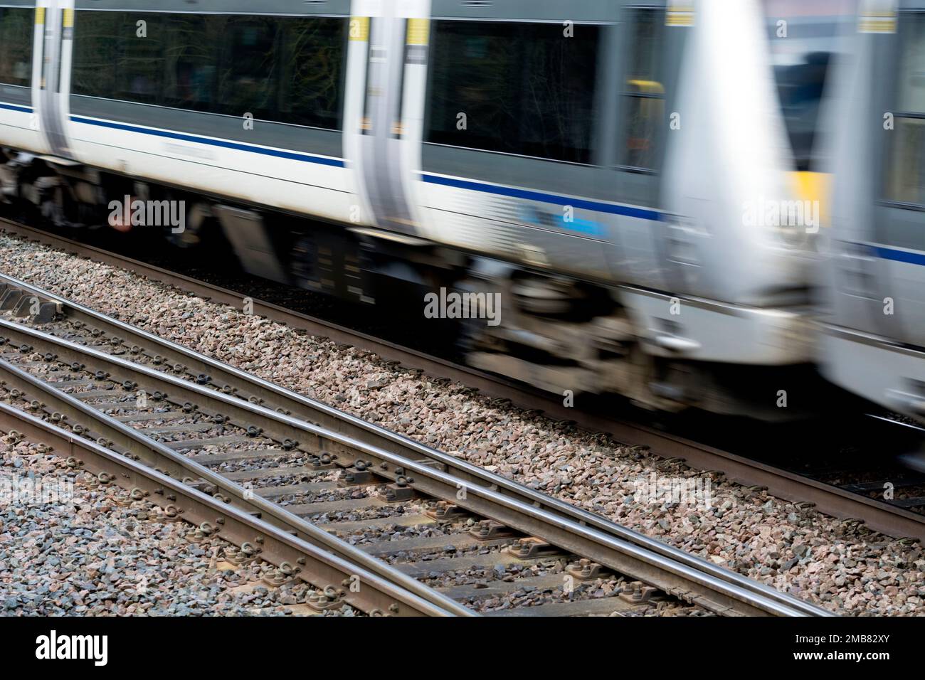 A Chiltern Railways diesel train, blurred at speed, Warwickshire, UK ...