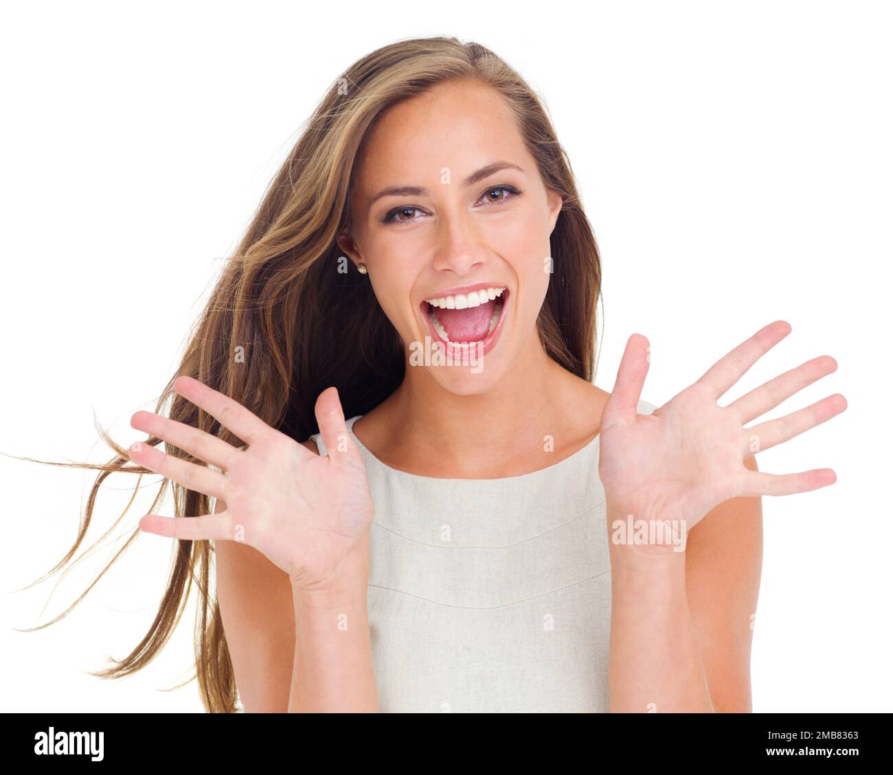 Portrait, wow and a woman excited in studio isolated on a white ...