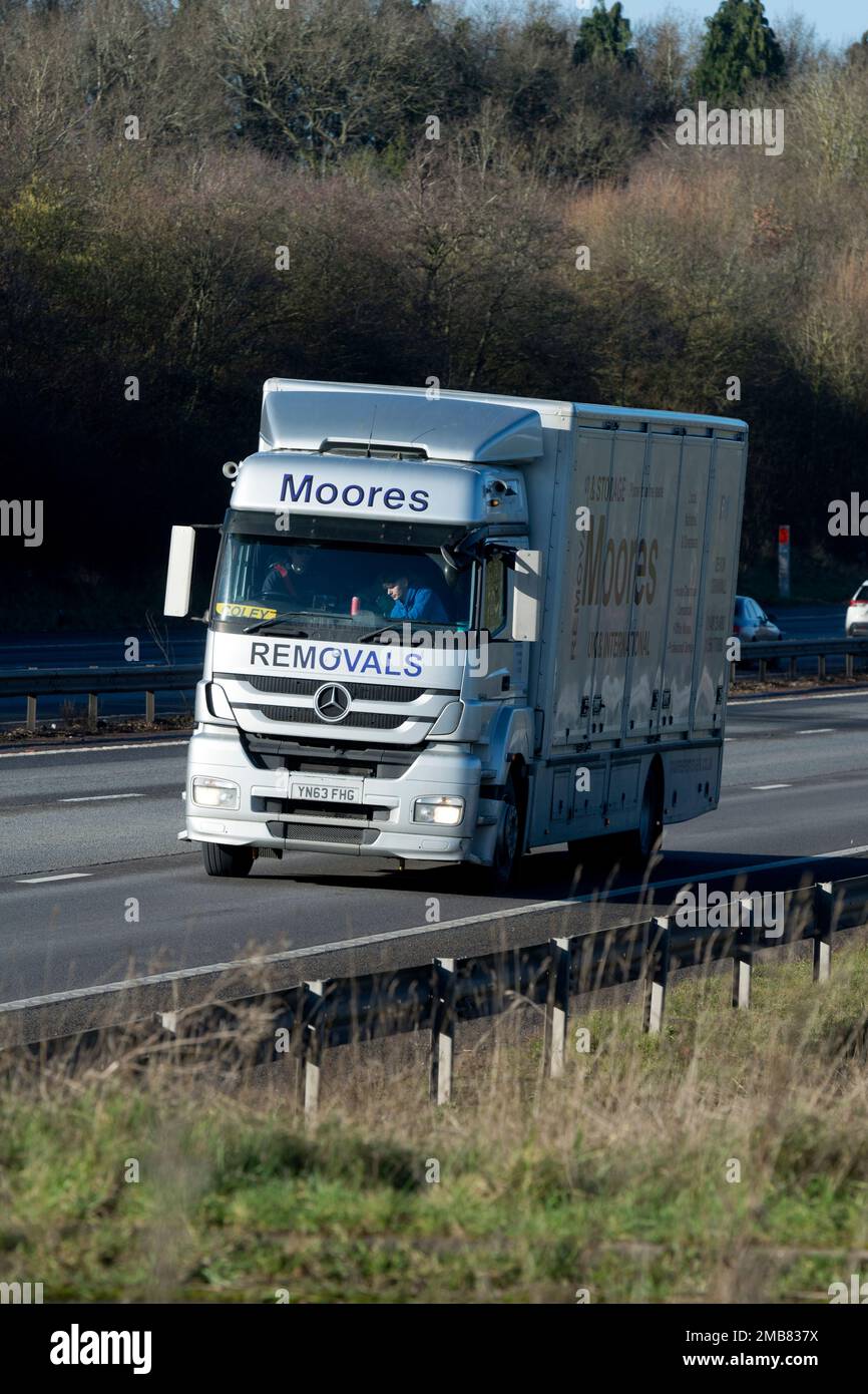 A Moores Removals Mercedes lorry on the M40 motorway, Warwickshire, UK ...