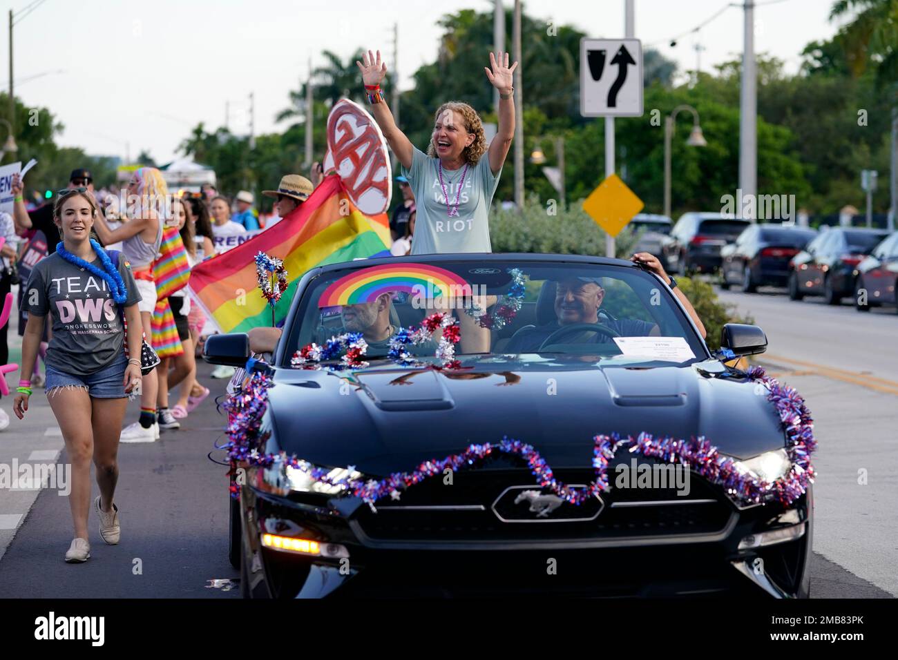 Rep. Debbie Wasserman Schultz, D-Fla., waves from a vehicle at the ...