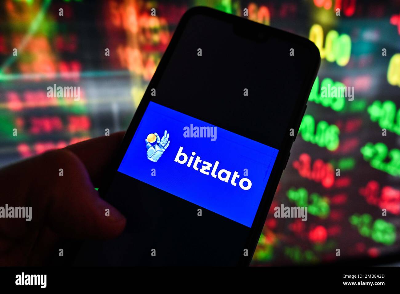 Poland. 20th Jan, 2023. In this photo illustration, the Bitzlato logo seen displayed on a ...