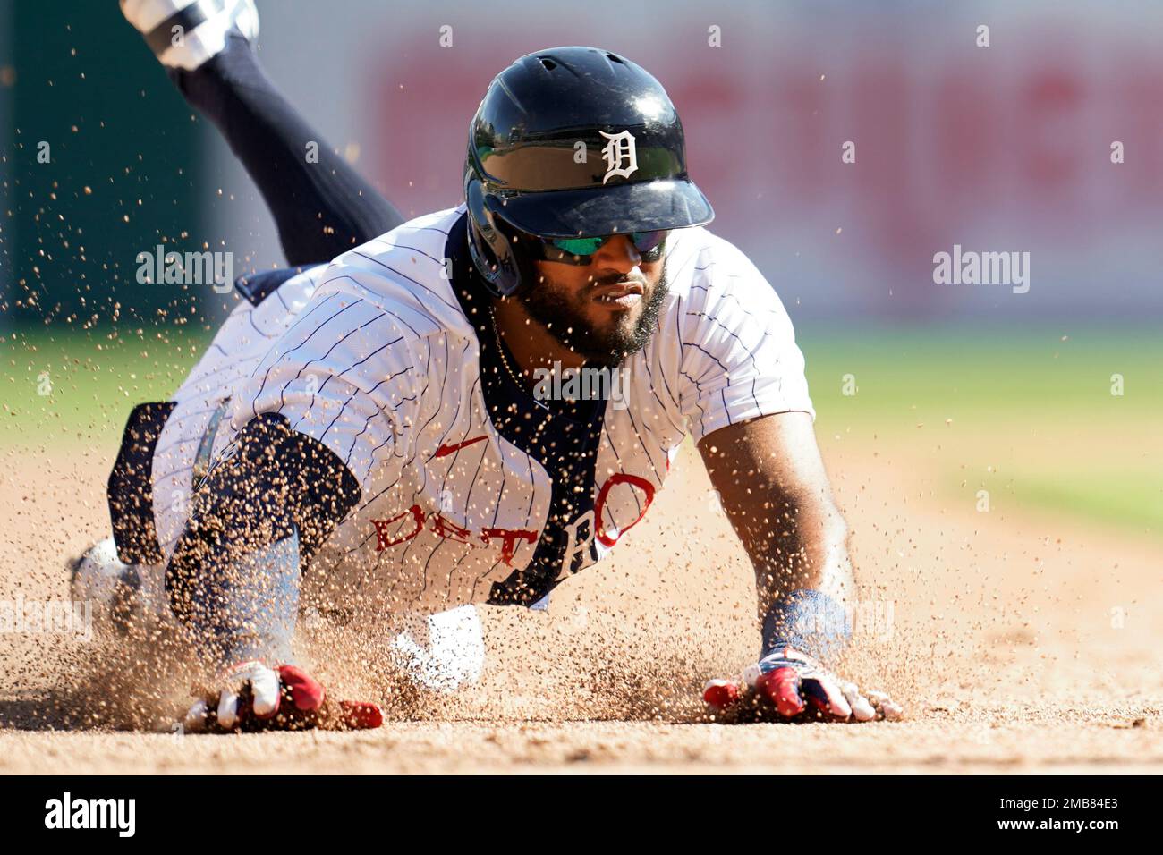 Detroit Tigers' Willi Castro slides into third base for a triple ...