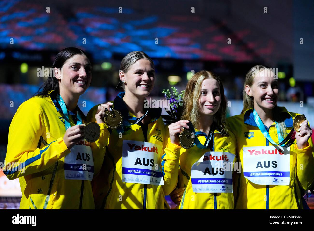 Members of team Australia pose with their medals after winning the ...