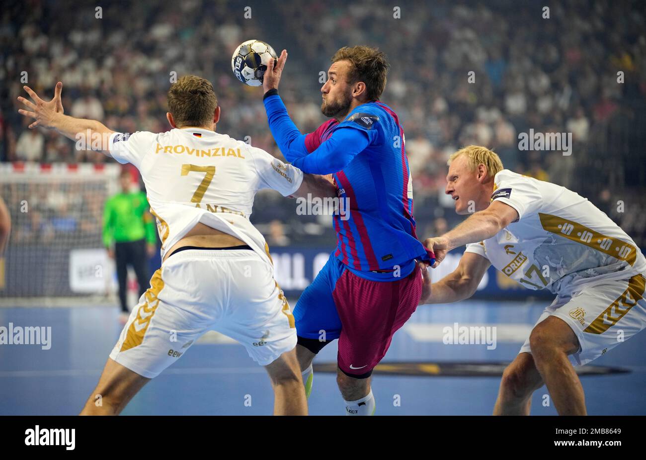 Barcelona's Luka Cindric, center, attacks during the Final Four ...
