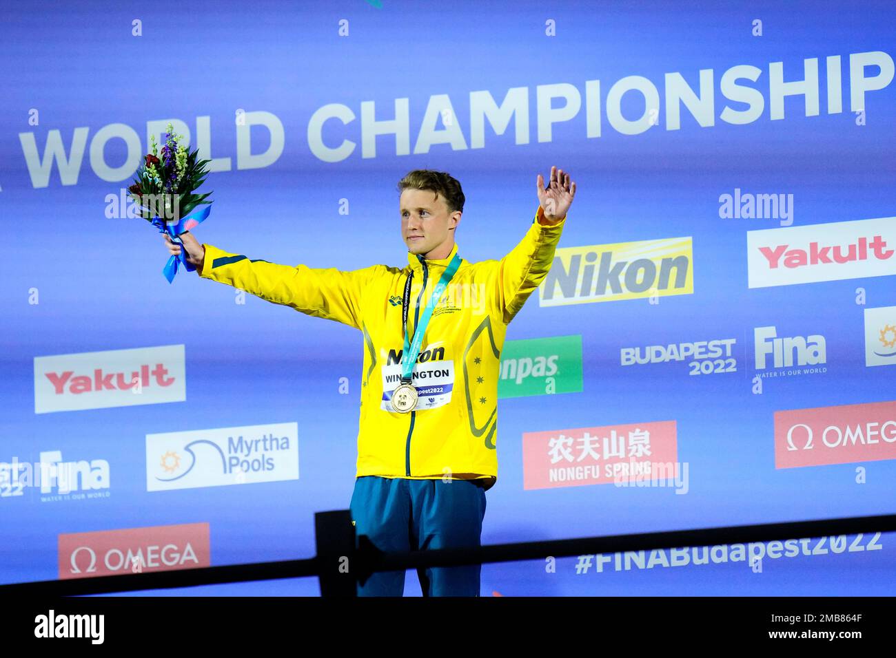 Elijah Winnington of Australia gestures on the podium after winning the ...