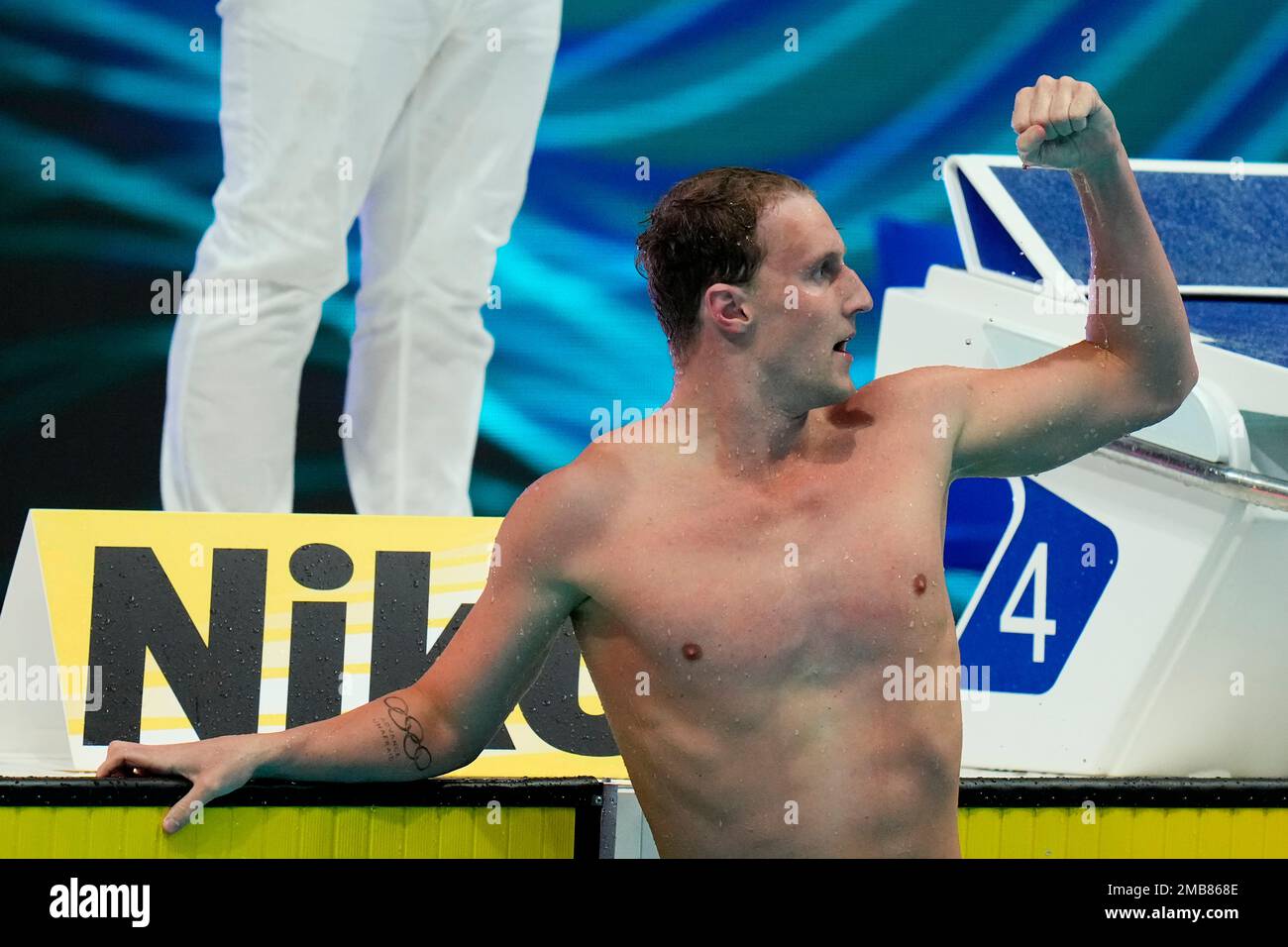 Elijah Winnington of Australia celebrates after finishing first during ...