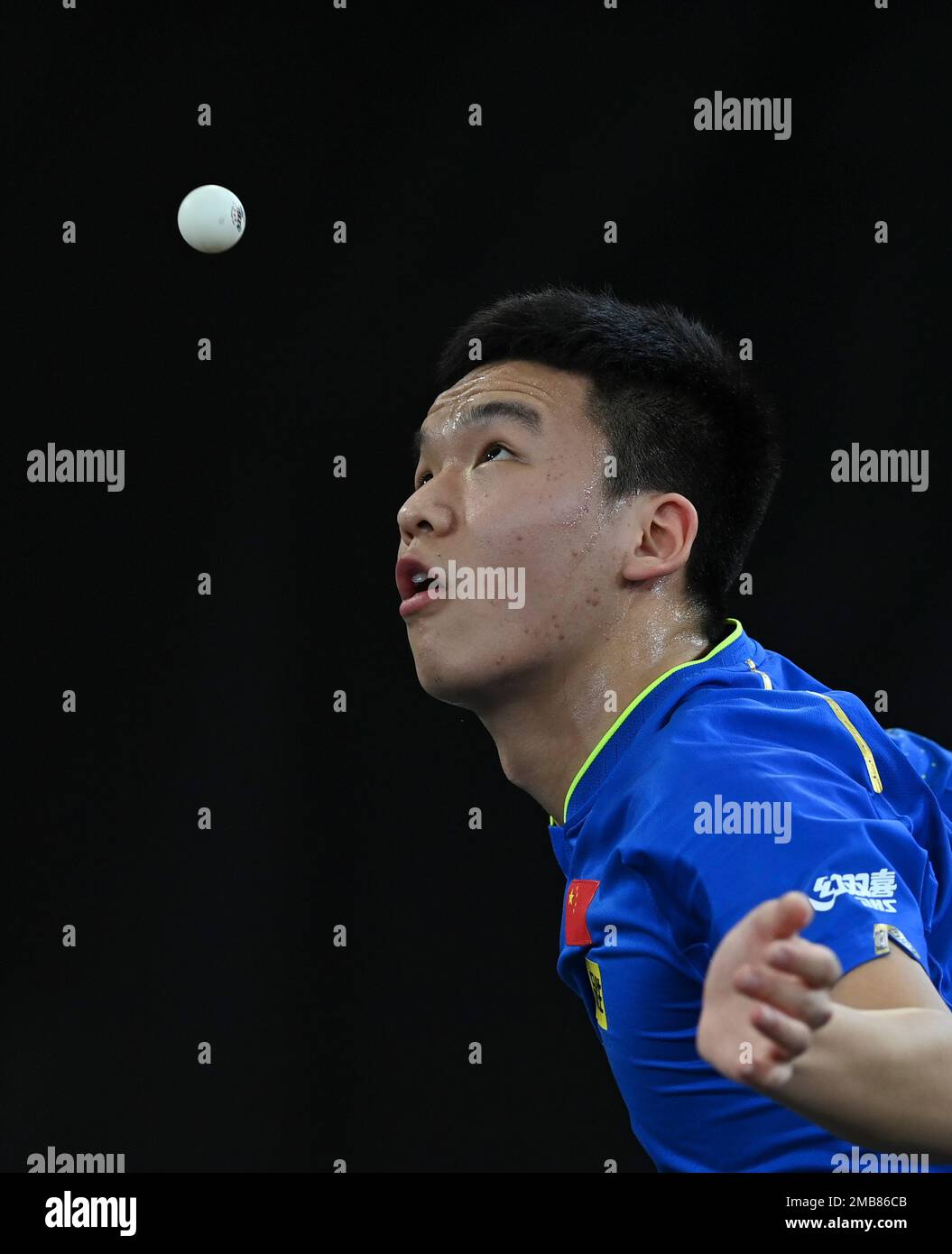 Doha, Qatar. 20th Jan, 2023. Xiang Peng of China serves during the men ...
