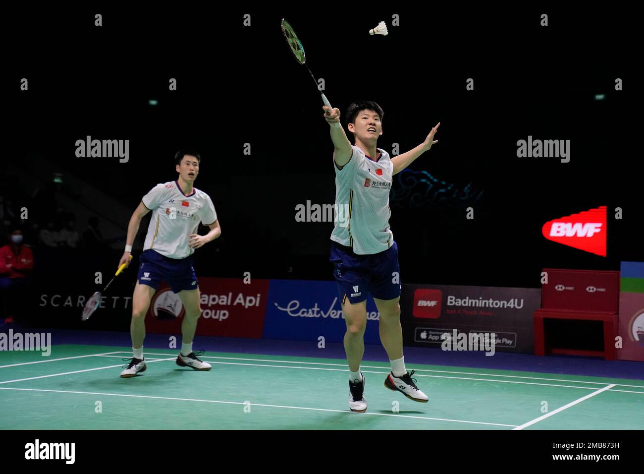 China's Liu Yu Chen, right, and Ou Xuan Yi compete against Malaysia's ...