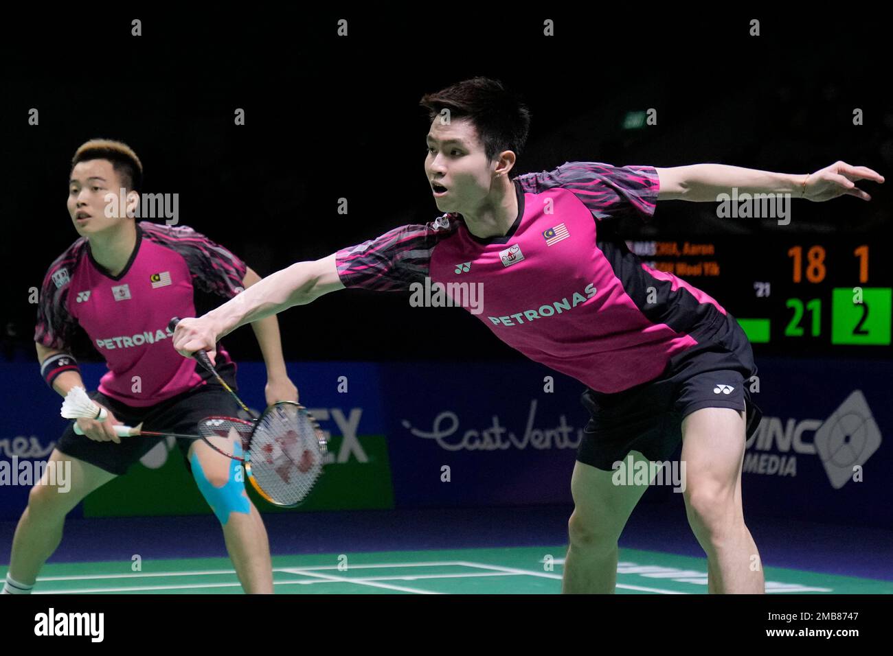 Malaysia's Aaron Chia, left, and Soh Wooi Yik compete against China's ...