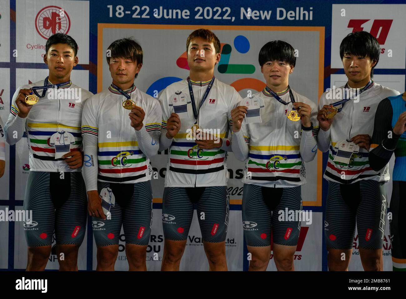 Riders of South Korea celebrate their gold medal during the award ...