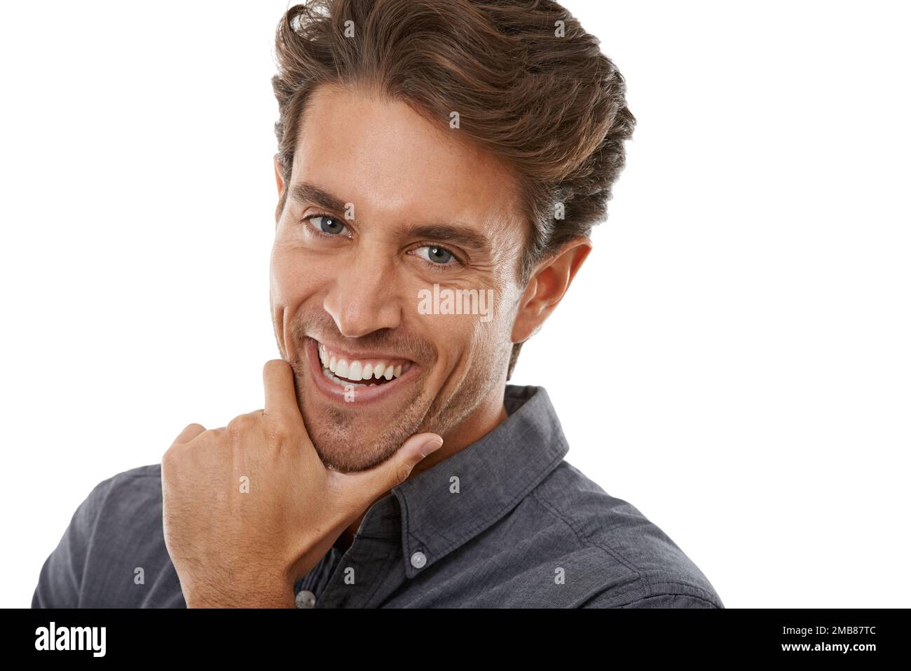 Cool and confident. Portrait of a handsome young man smiling against a ...