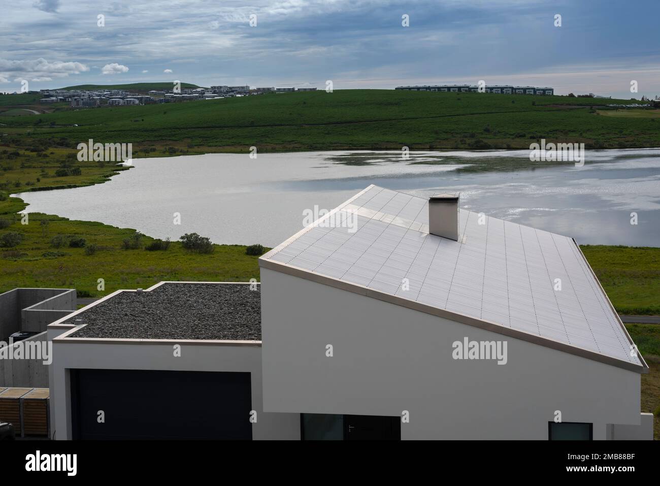 Scandinavian design residential home on lake in Reykjavik, Iceland ...